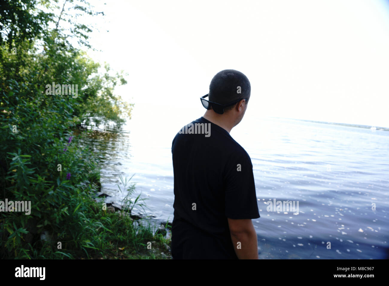 Handsome guy takes a selfie at the beach - people, lifestyle and ...
