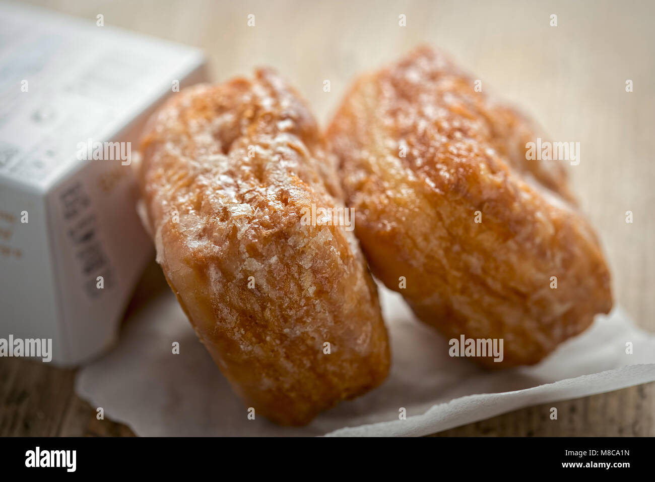 Mini American style soft iced doughnuts Stock Photo - Alamy
