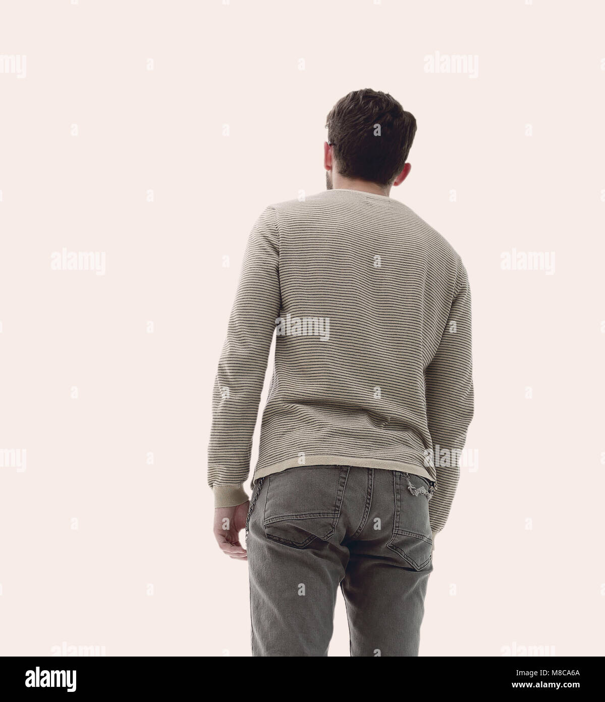 back view. Young modern man. Photo in full growth Stock Photo - Alamy