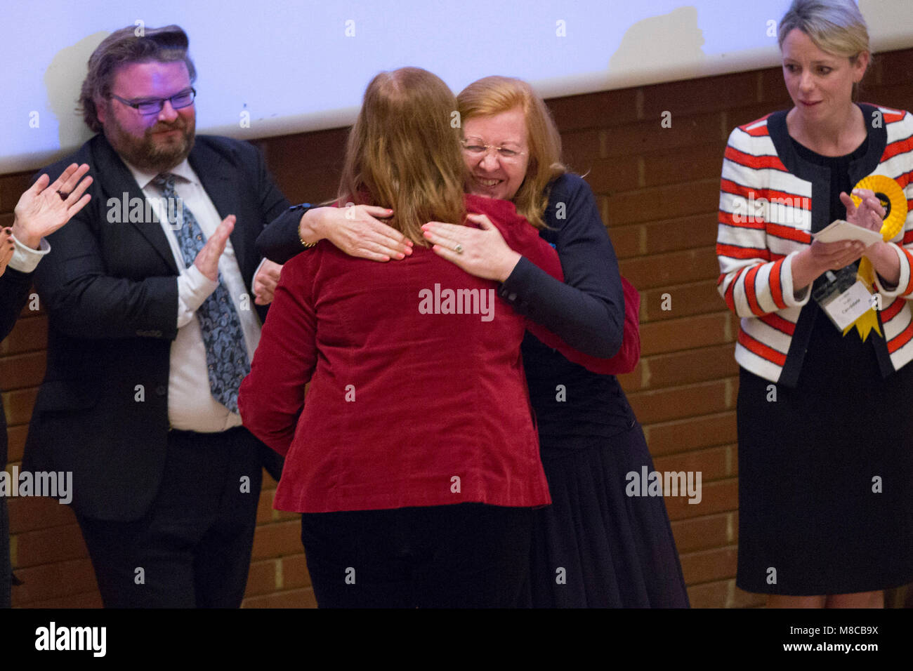 Labour Party MP Emma Dent Coad (red jacket) is congratulated as she is ...