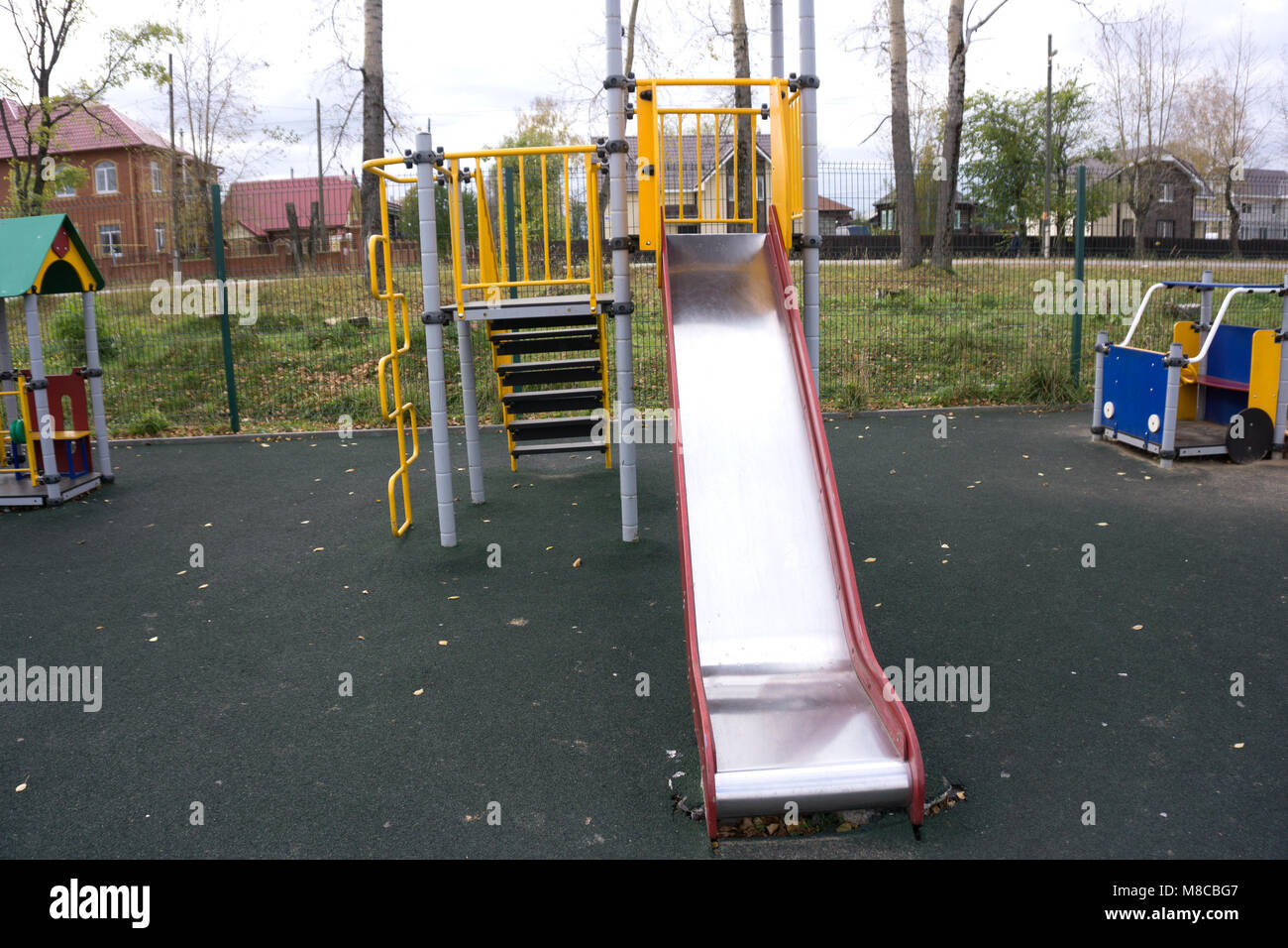 children's slides and playgrounds Stock Photo - Alamy