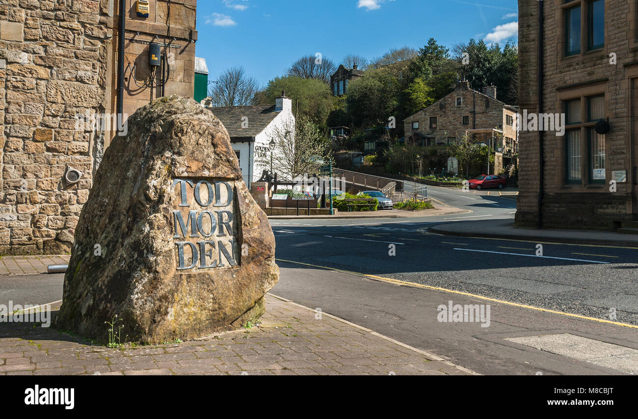 The sign entering the West Yorkshire town of Todmorden on stone Stock ...