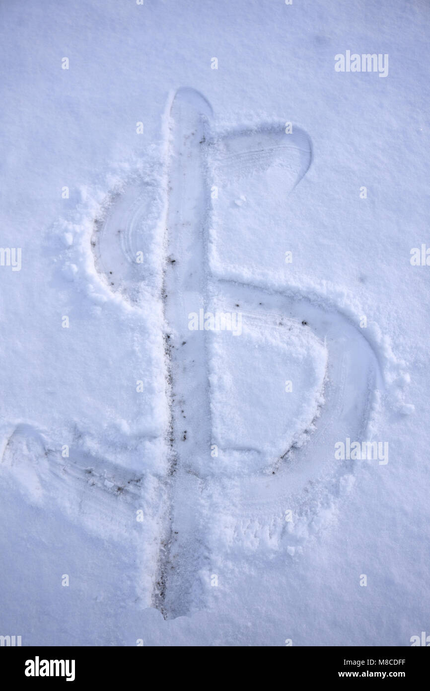 dollar sign in the snow Stock Photo - Alamy