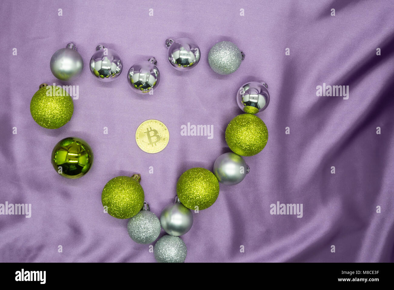 the sign of the heart and Golden bitcoin coin, love and money selecting ...