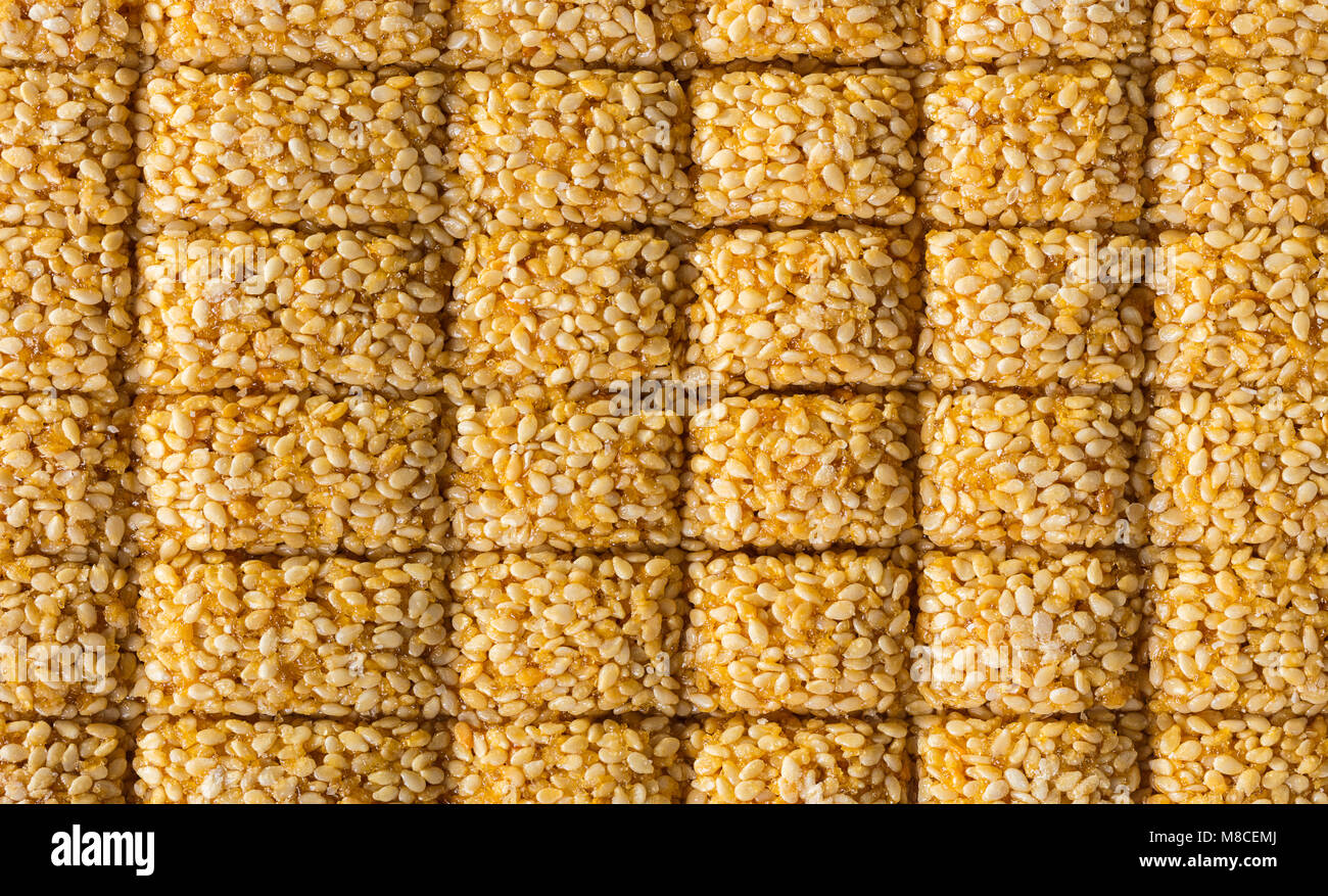 food background texture of sesame in caramel close-up Stock Photo - Alamy