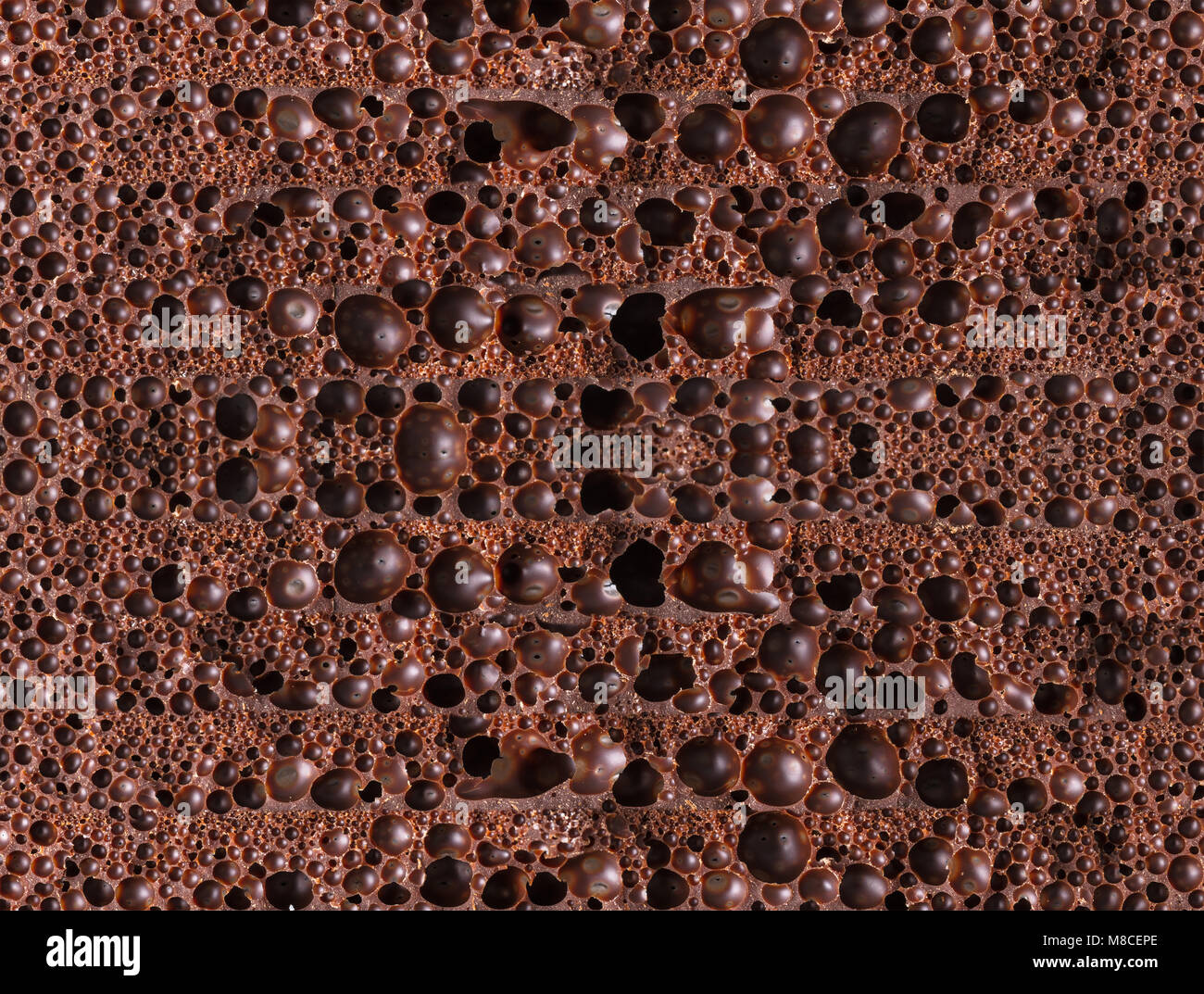 food background texture of porous chocolate close-up Stock Photo - Alamy