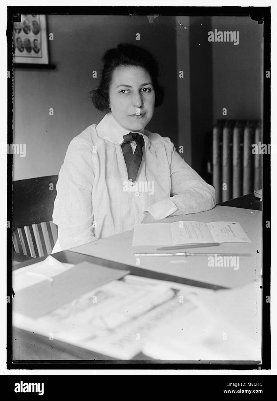 A formal portrait of Evalyn Abbott, capturing her likeness as a ...