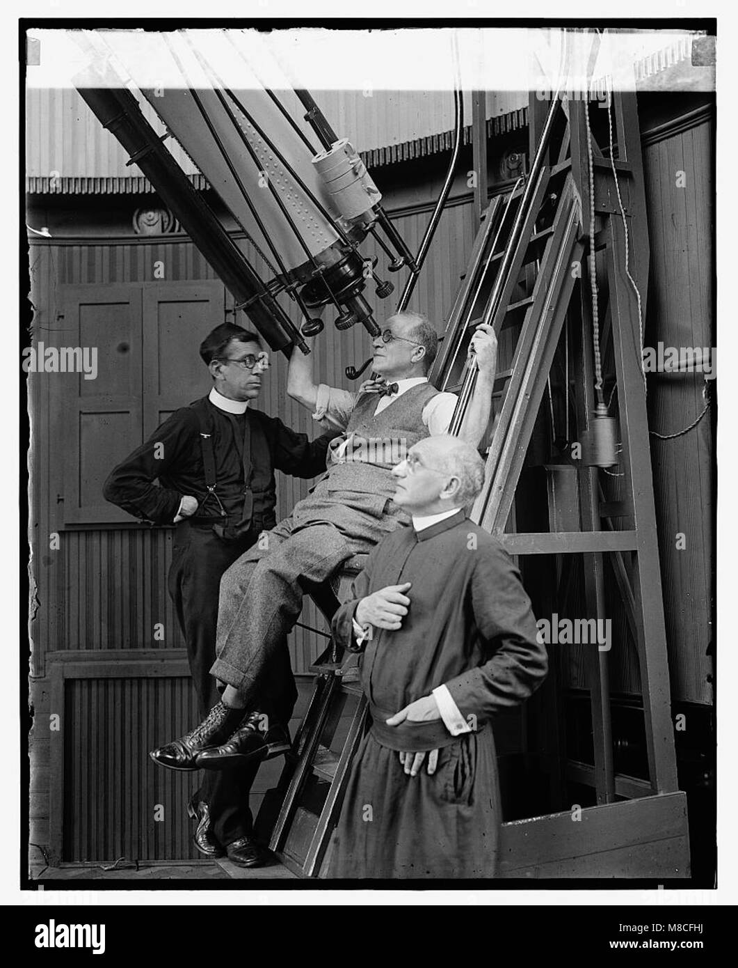 A photograph of Father F.H. Tondorf, Professor David Todd, and Father ...