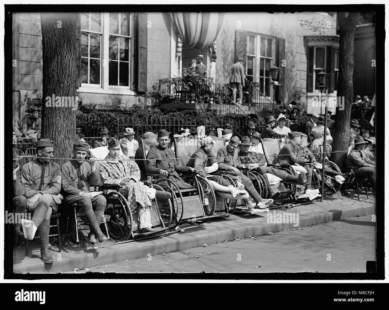 This image features various views of a parade by the First Division of ...