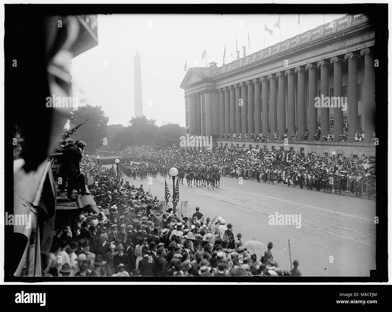 This collection of photographs showcases various views of a parade ...