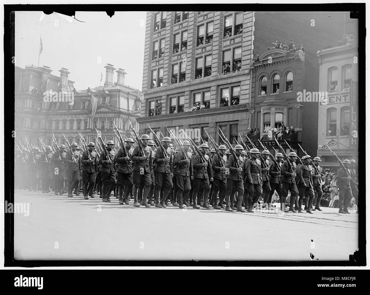 A collection of images featuring the First Division of the American ...