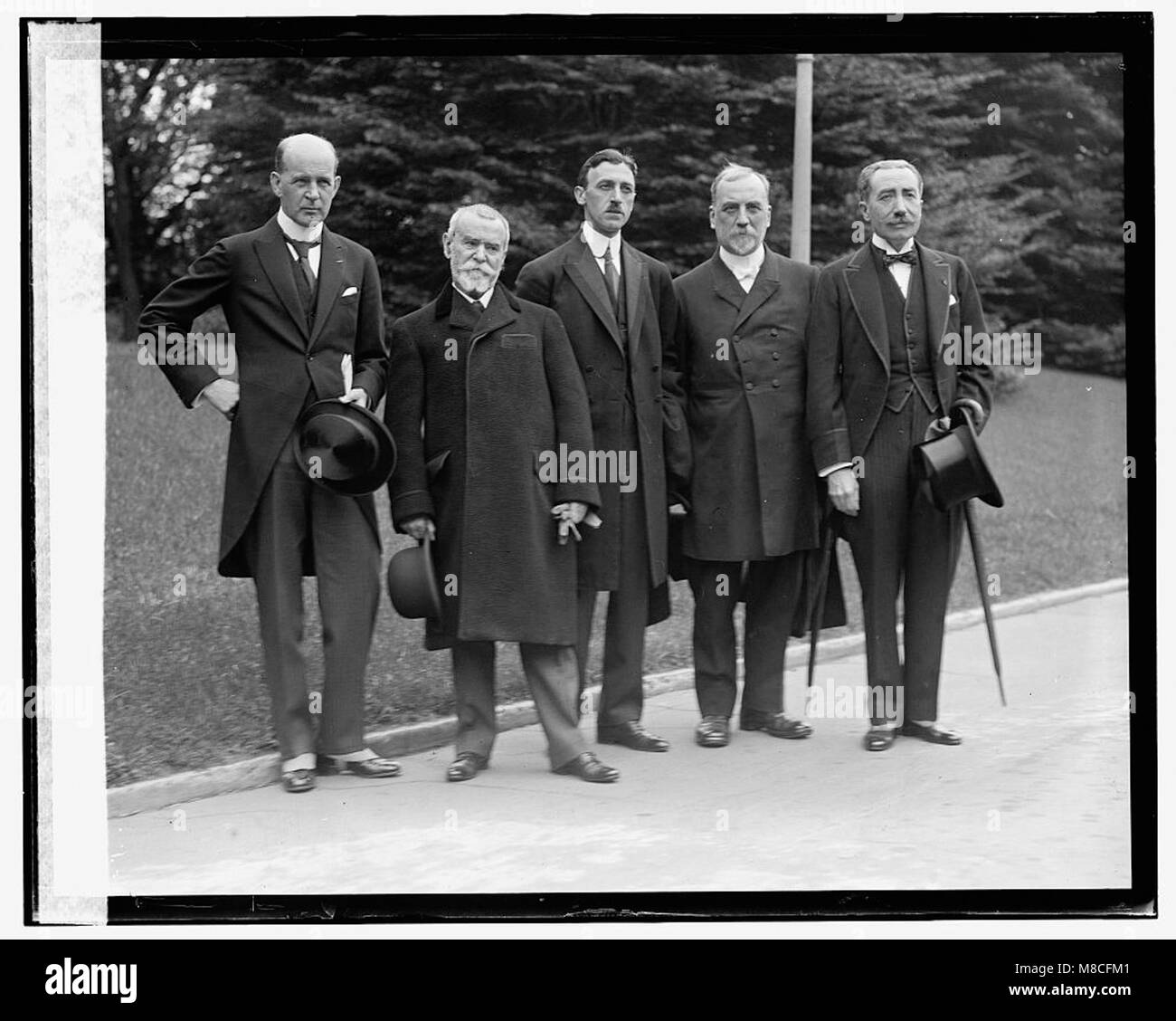 This photograph shows five unidentified men, taken on May 10, 1924. The ...