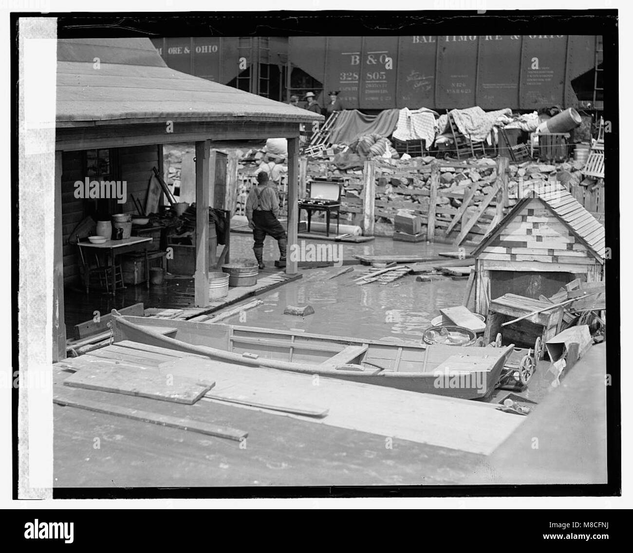 This image shows the aftermath of a flood, capturing the extent of ...