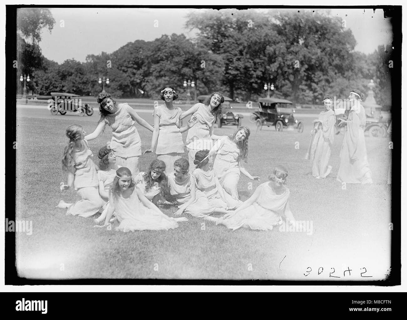 This historical tableau depicts a Fourth of July celebration, featuring ...