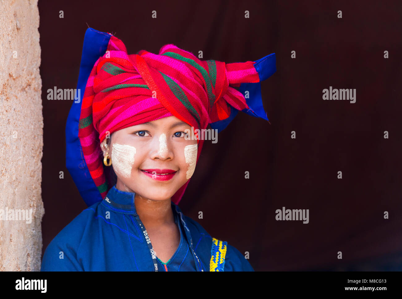 young Pa O lady wearing colourful headscarf & thanaka on face at Shwe ...