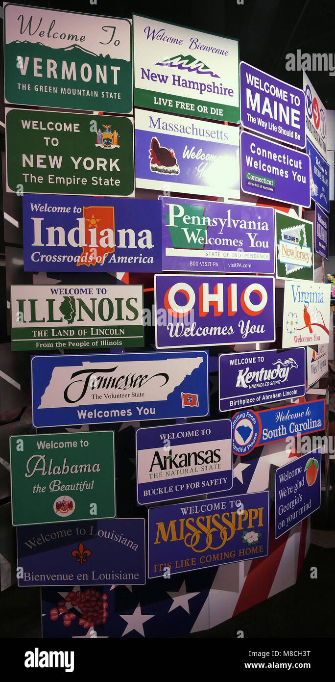 US states welcoming signs close up view on display in a touristic fair ...