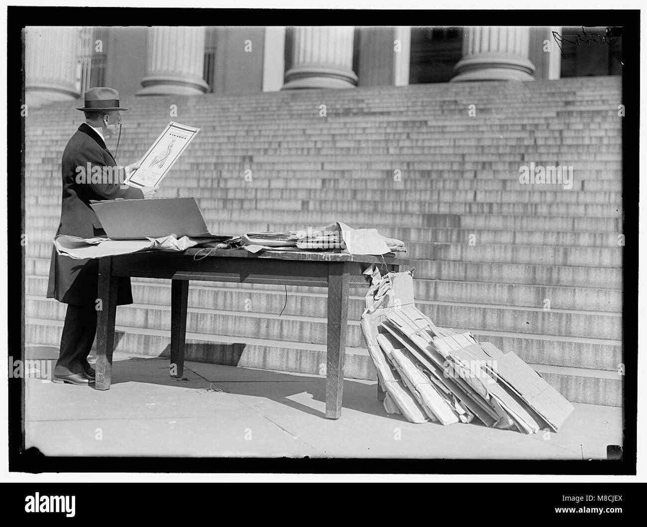 Carter Glass, a prominent U.S. government official, is shown alongside ...