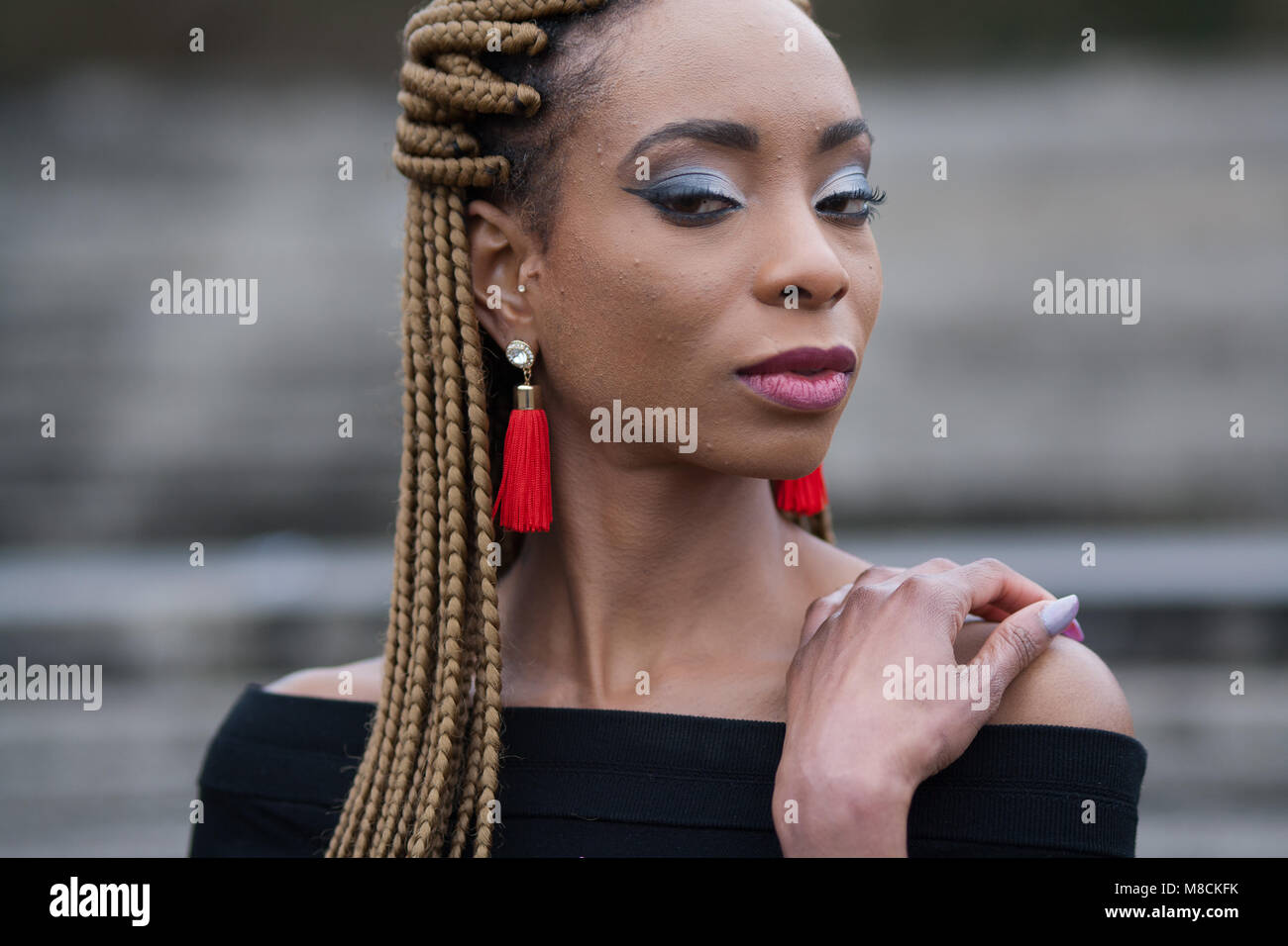 West Indian woman posing clothes Stock Photo - Alamy