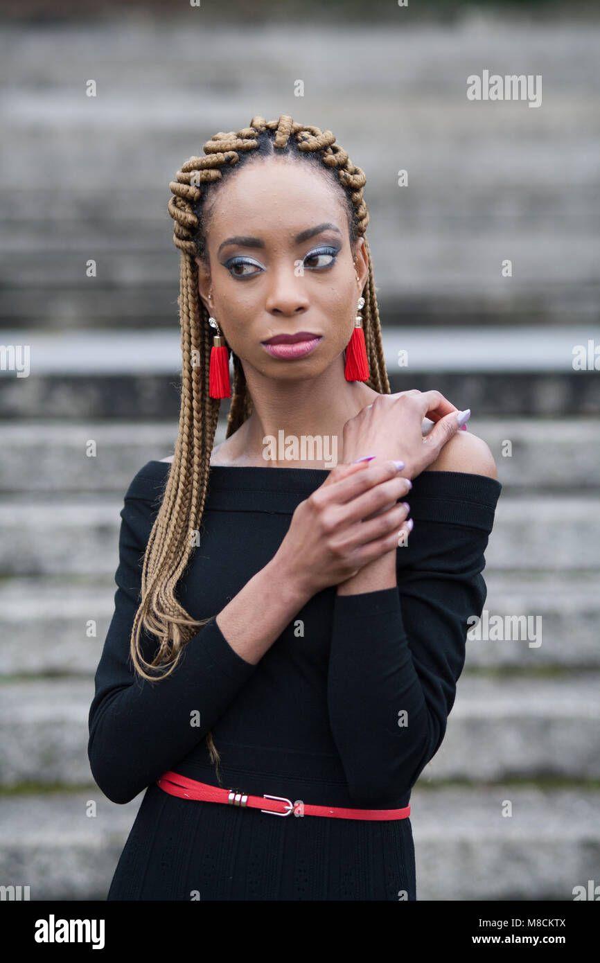 West Indian woman posing clothes Stock Photo - Alamy