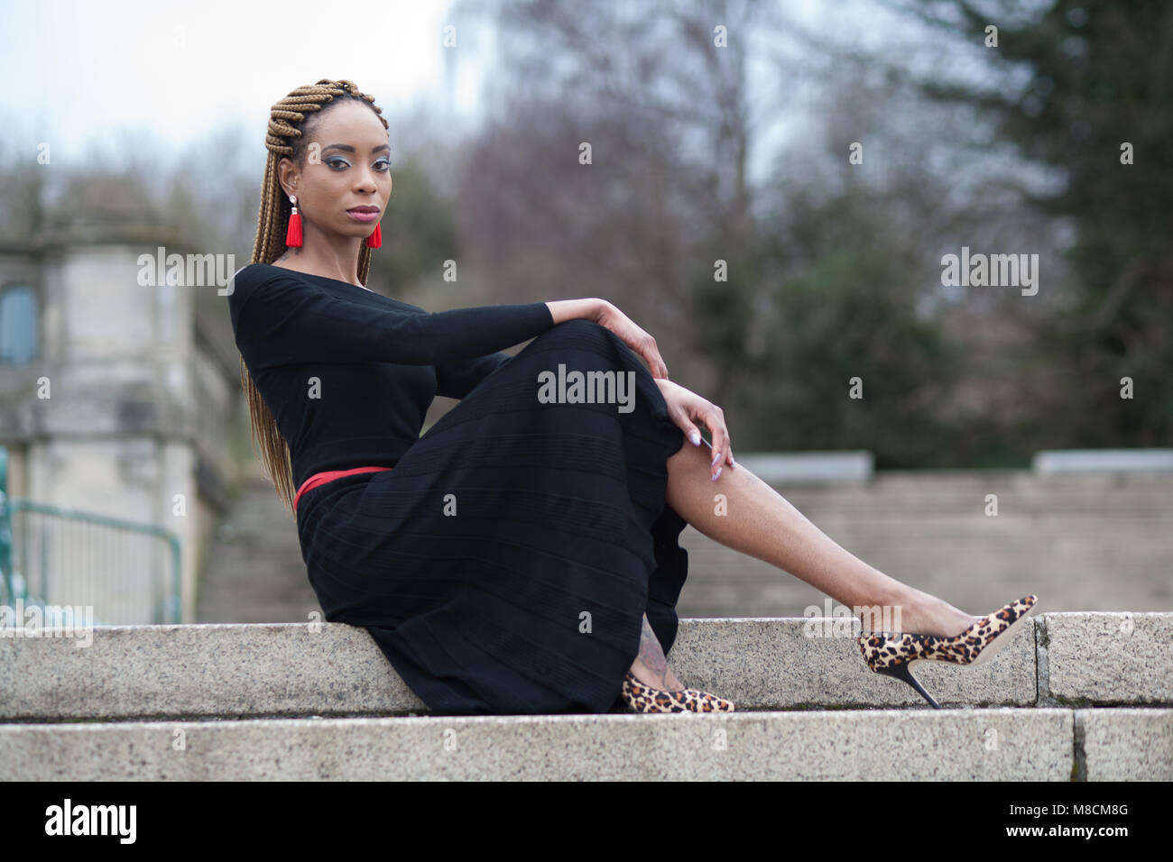 West Indian woman posing clothes Stock Photo - Alamy