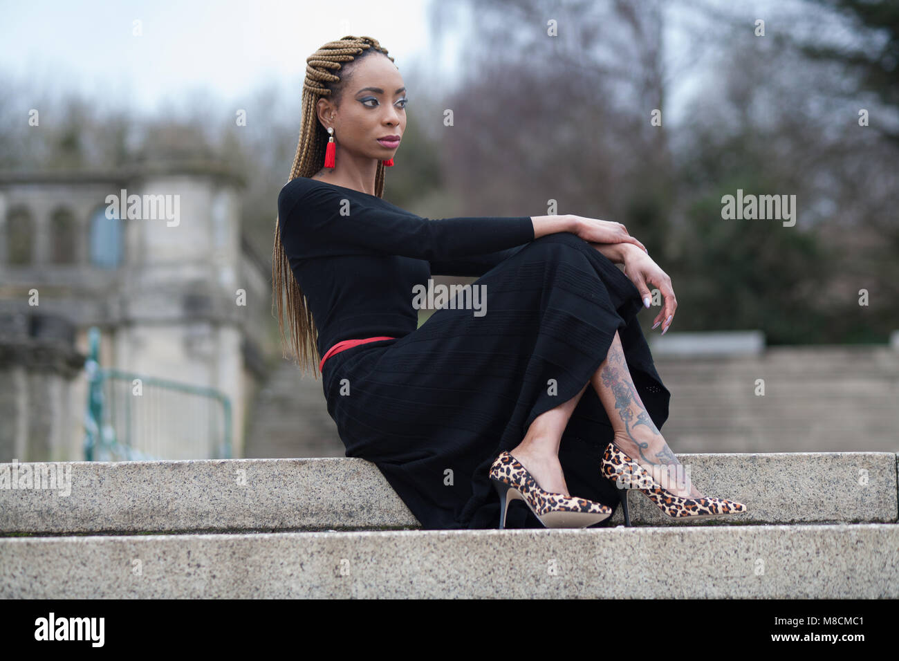 West Indian woman posing clothes Stock Photo - Alamy