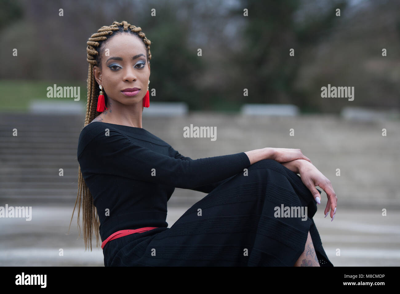 West Indian woman posing clothes Stock Photo - Alamy
