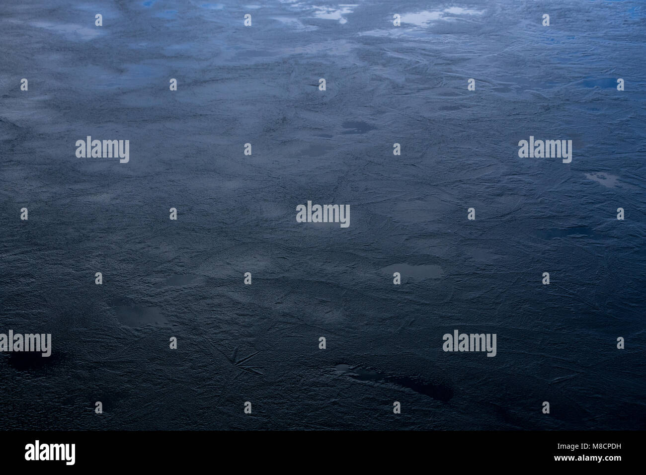 Surface of frozen lake / detail Stock Photo - Alamy