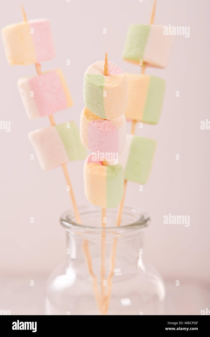 Marshmallows on wooden table Stock Photo - Alamy