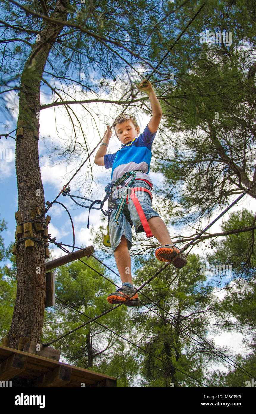 Boy walking playing equipment park boys hi-res stock photography and ...