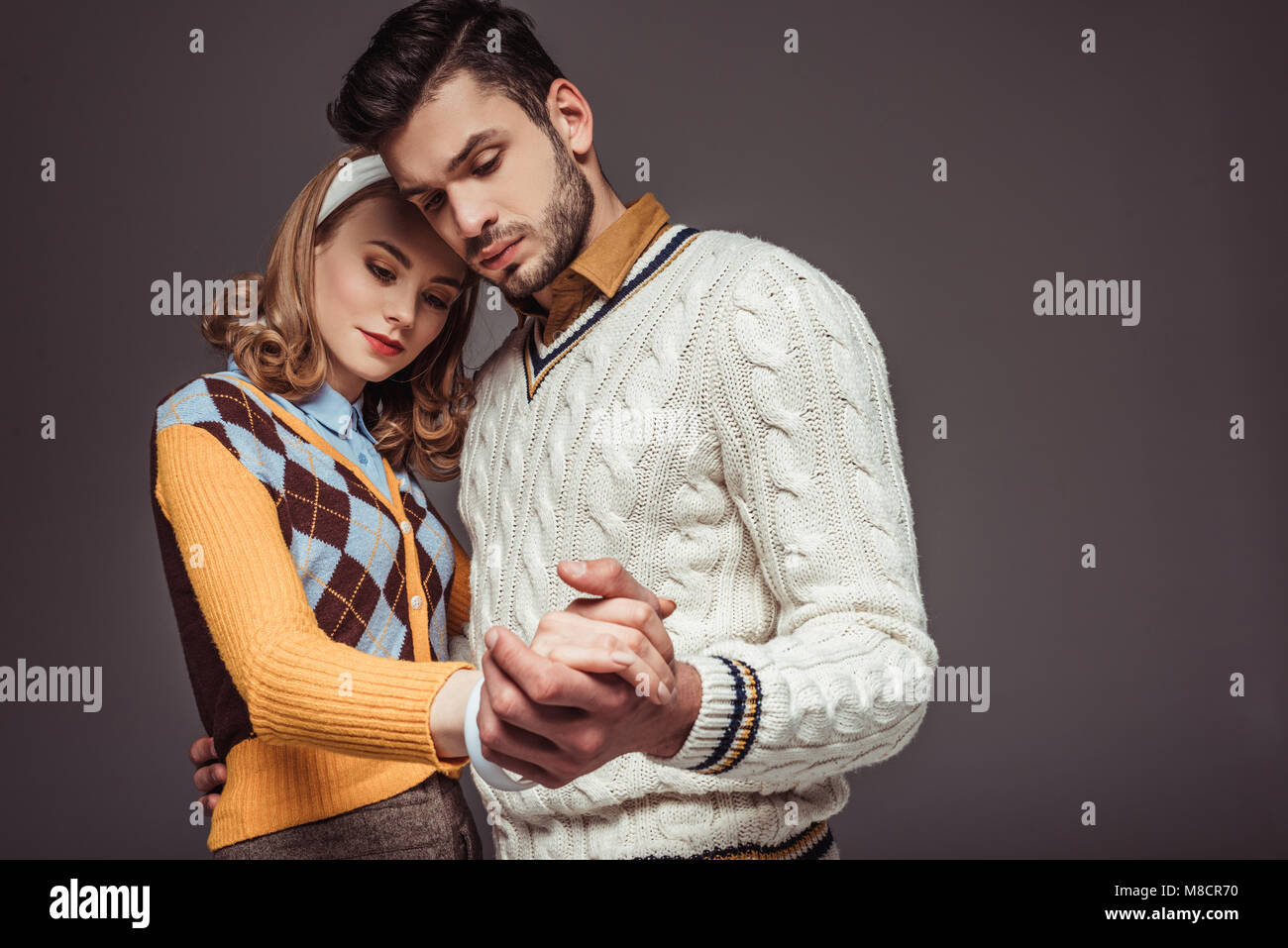 beautiful retro styled couple dancing isolated on grey Stock Photo - Alamy