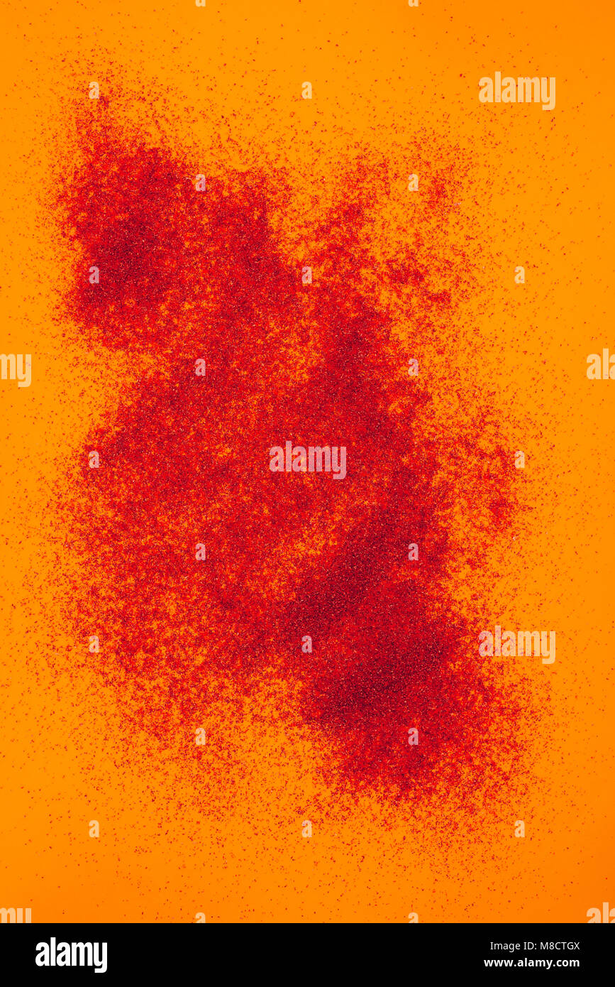 top view of scattered red sand on orange surface Stock Photo - Alamy