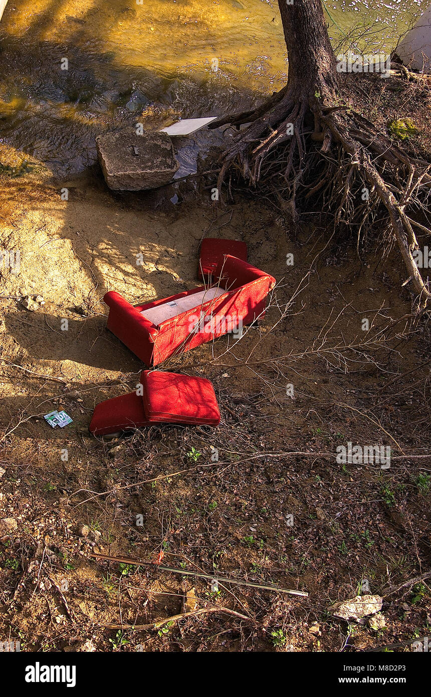 Trash dumped over bridge in country Stock Photo - Alamy