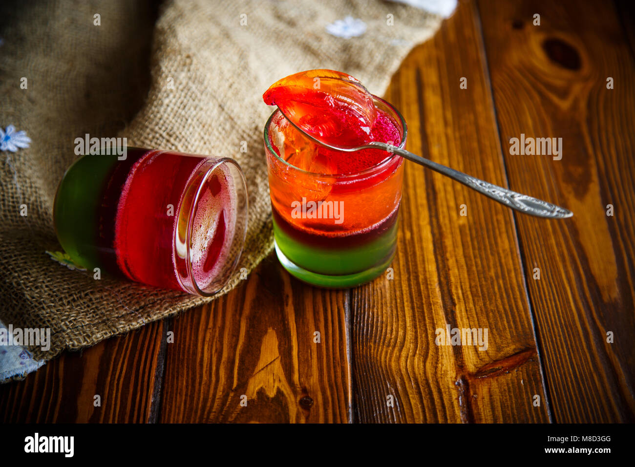 jelly fruit colored puff in a glass beaker Stock Photo - Alamy