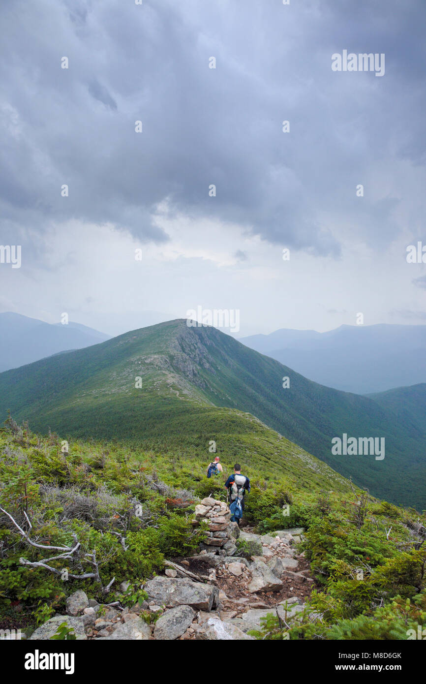 Two hikers descending the Bondcliff Trail in the Pemigewasset ...