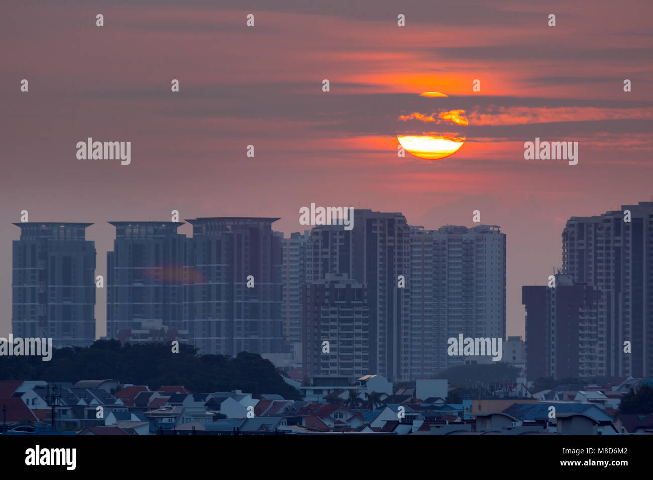 Sun over Singapore housing residential neighborhood district during ...