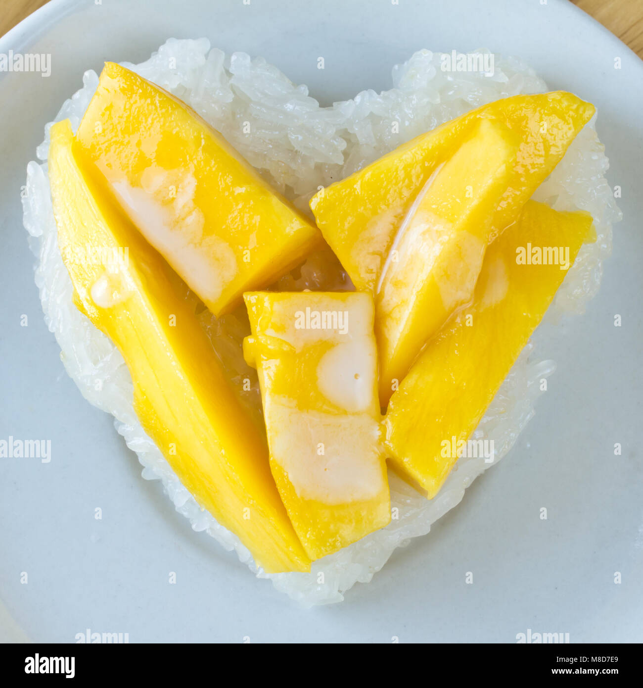Sticky Rice with Mango on dish Stock Photo - Alamy