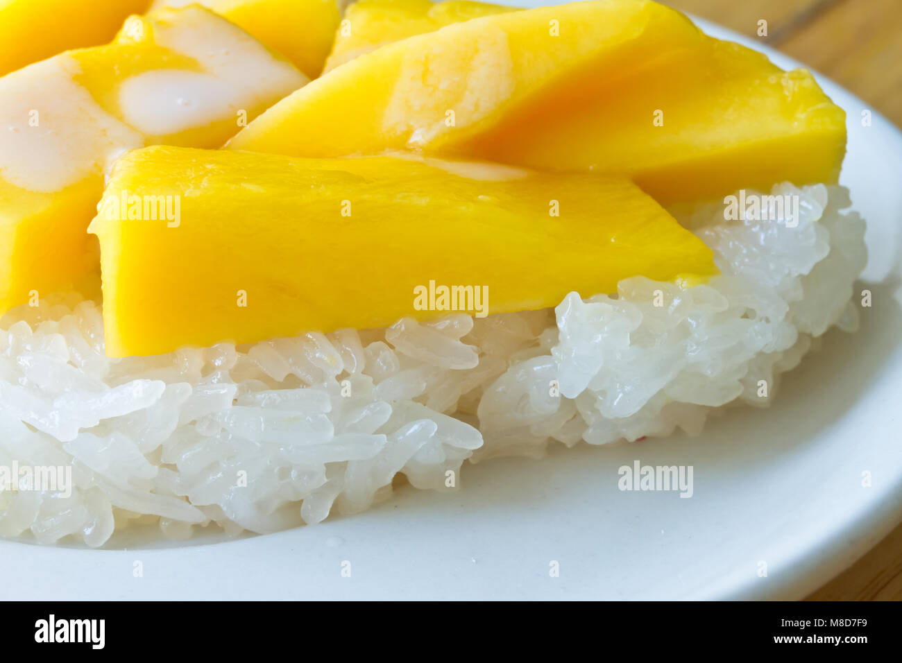 Sticky Rice with Mango on dish Stock Photo - Alamy