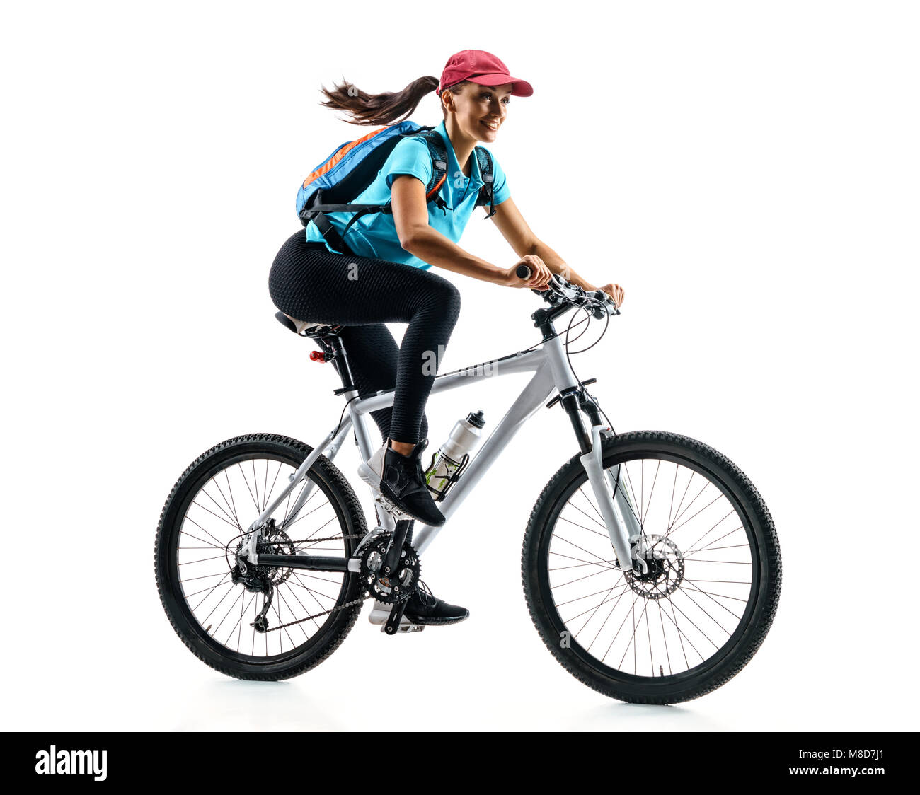 Woman riding bike to work Cut Out Stock Images & Pictures - Alamy
