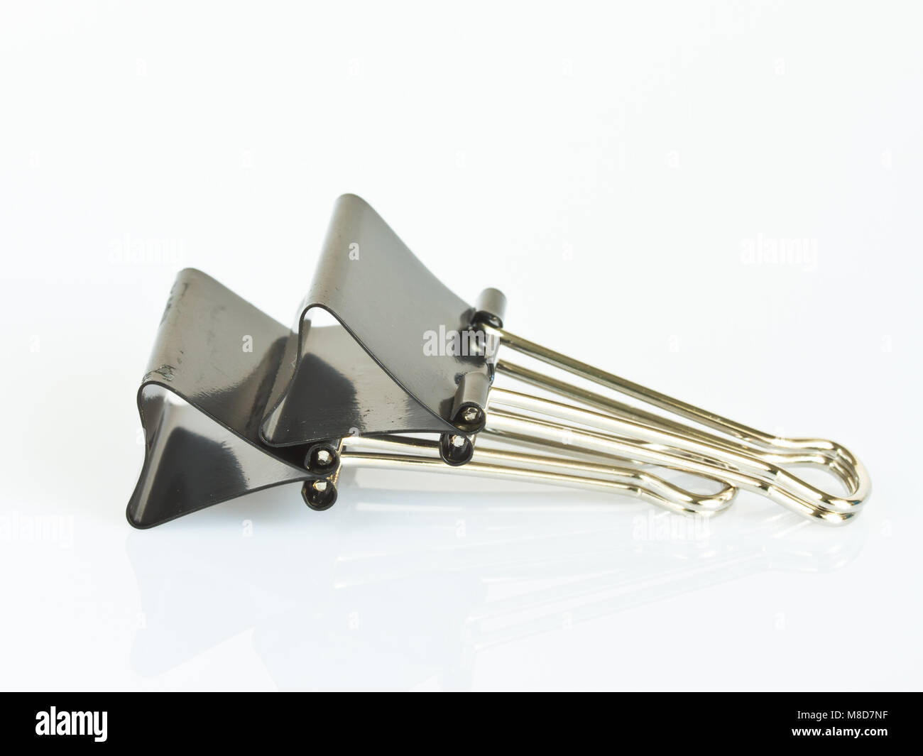 paperclip on white background Stock Photo - Alamy