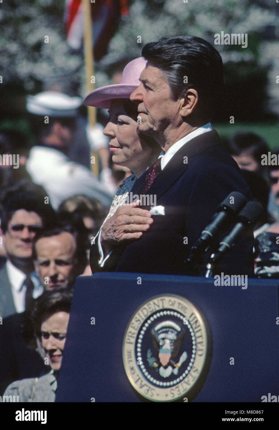 Washington, DC. , USA, April 18, 1982 President Ronald Reagan holds his ...