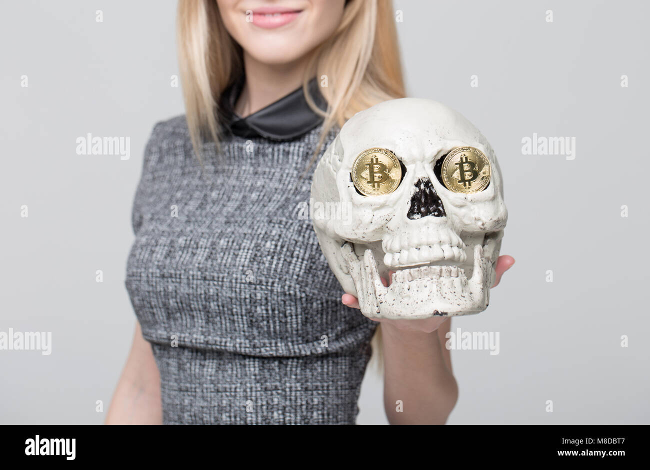 Female hand holding skull hi-res stock photography and images - Alamy