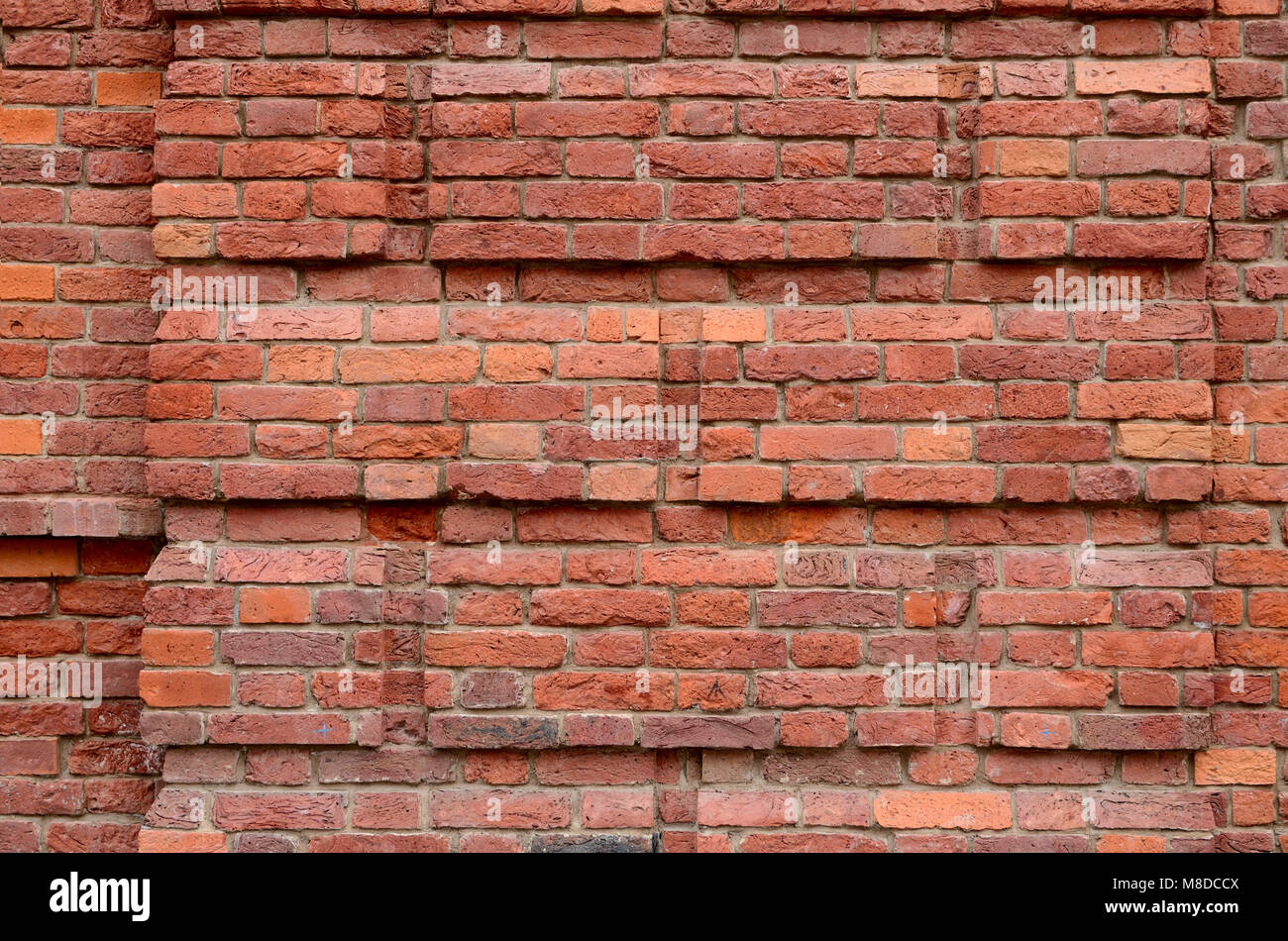 Wall of red brick.Masonry has a peculiar texture Stock Photo - Alamy