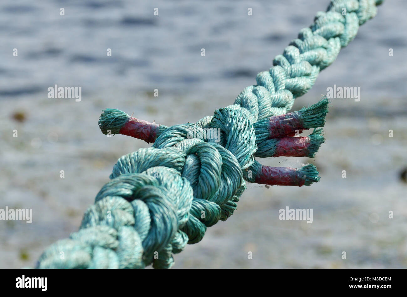 Tied a strong knot.The ship is attached by rope to the waterfront Stock ...
