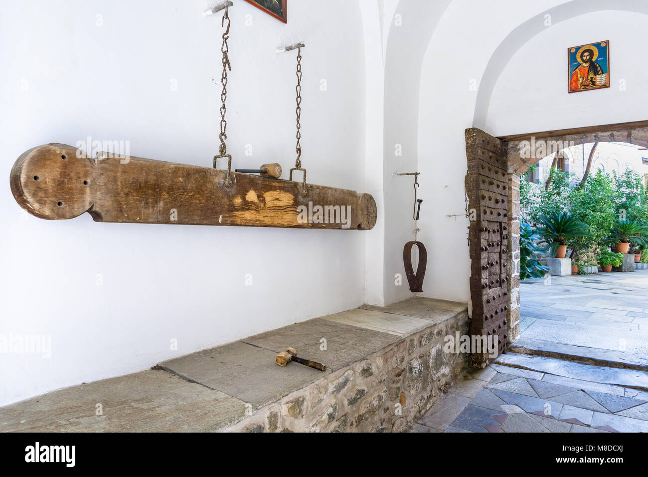 A wooden semantron to call the monks to prayer at the entrance to Osiou ...