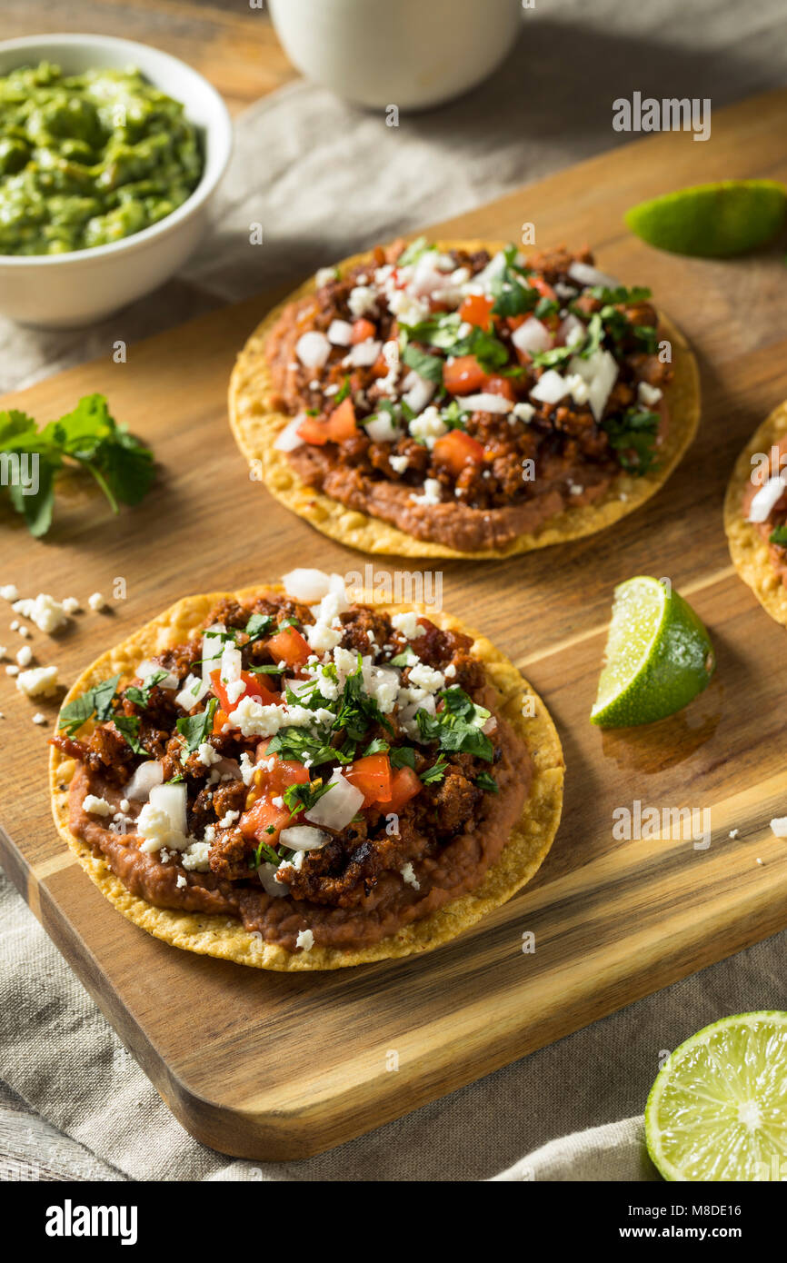 Homemade Beef and Cheese Tostadas with Lime and Cilantro Stock Photo ...