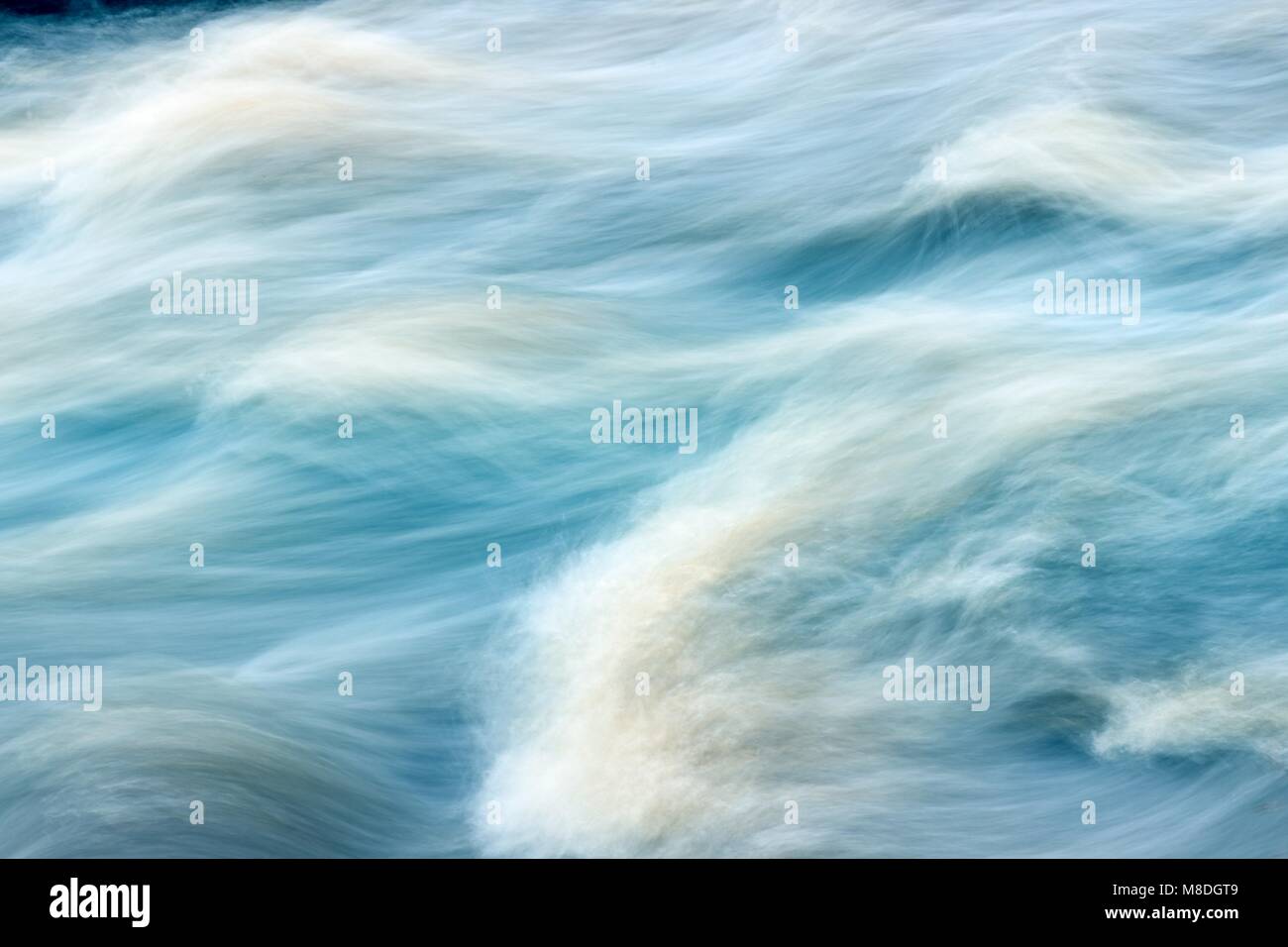 Flowing water abstract, wave motion background Stock Photo - Alamy