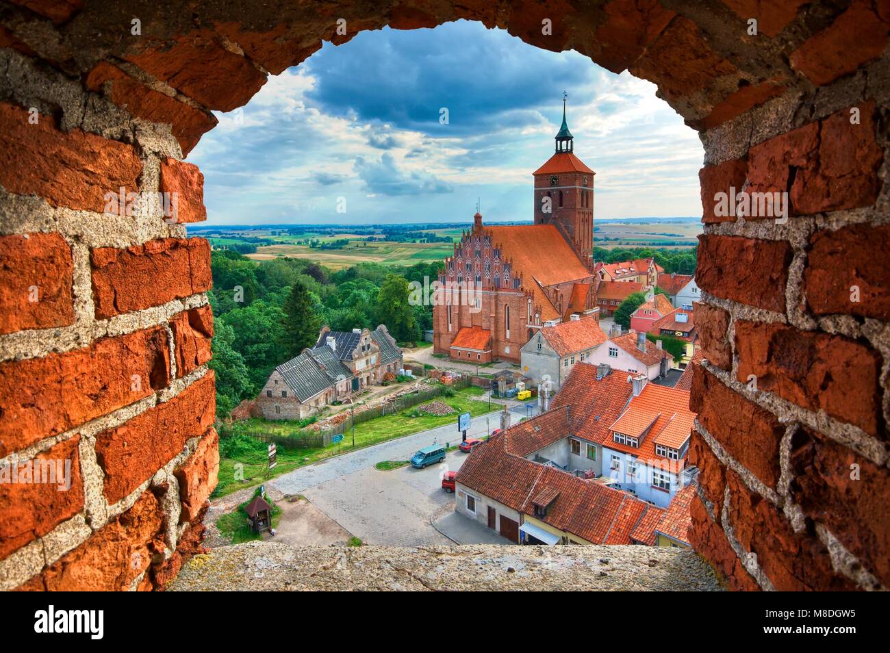 View of old town and church through the castle tower window, Reszel ...