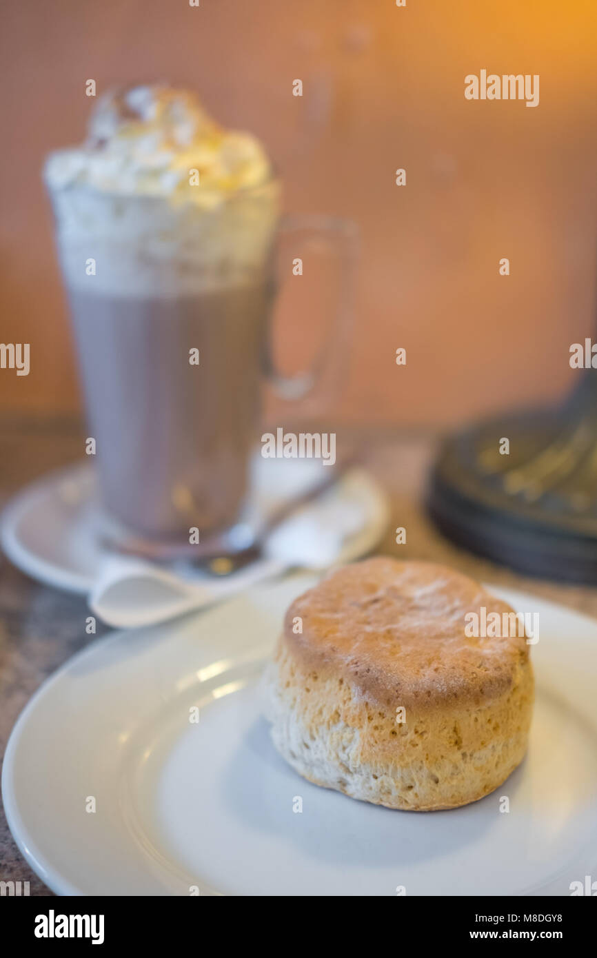 Scone with Hot chocolate in the cafe Stock Photo - Alamy