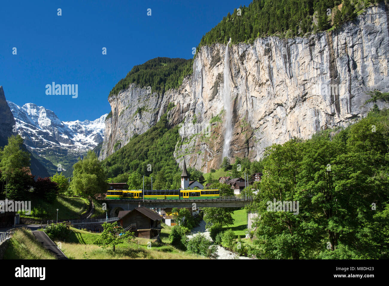 Lauterbrunnen village staubbachfall waterfall hi-res stock photography ...