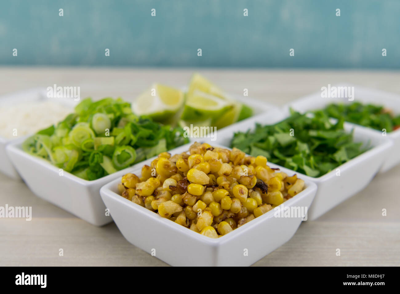 Close up of Roasted Corn with other seasonings behind Stock Photo - Alamy